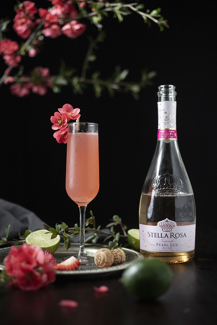 Pink 75 - A Sparkling Rosé Cocktail with Strawberries and Guava - Moody ...
