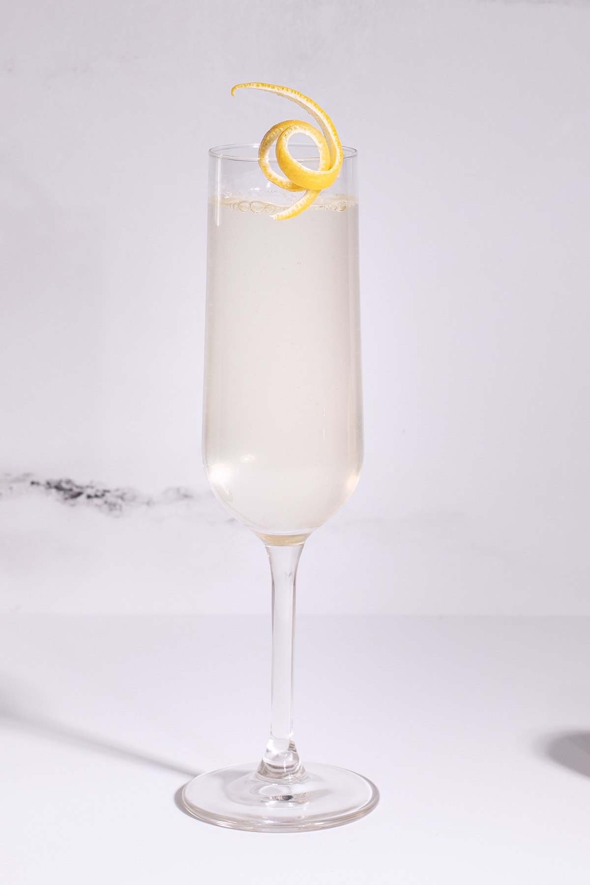 Classic French 75 (Gin and Champagne Cocktail) - Moody Mixologist
